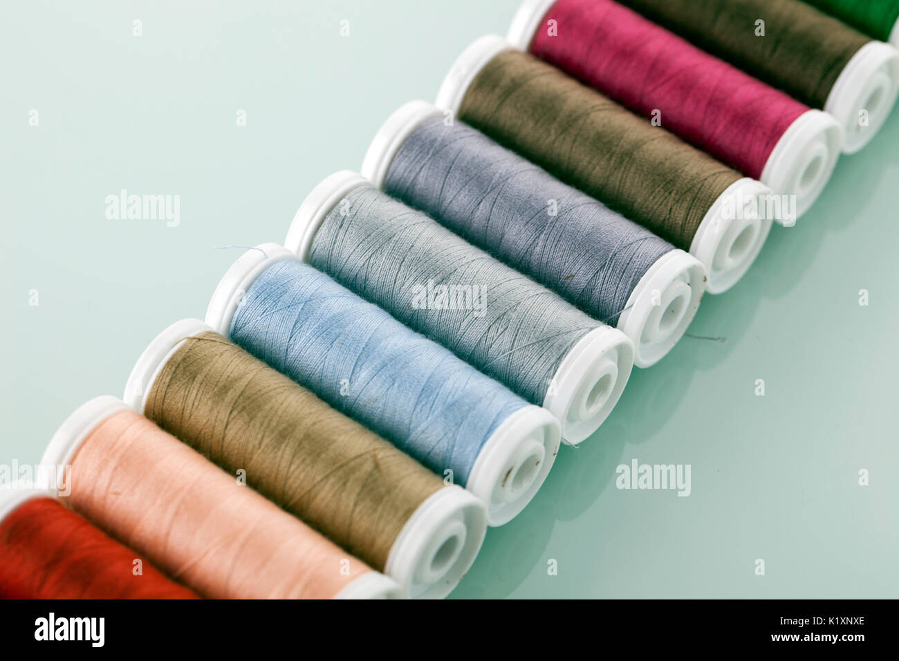 Sewing threads isolated on white background. Studio Shot Stock Photo ...