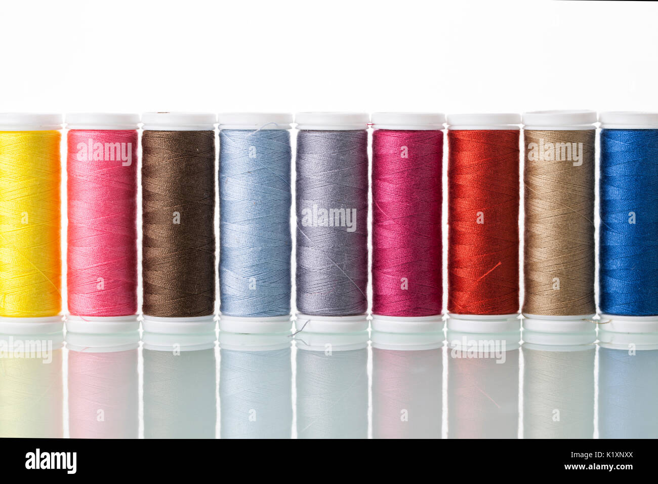 Sewing threads isolated on white background. Studio Shot Stock Photo ...