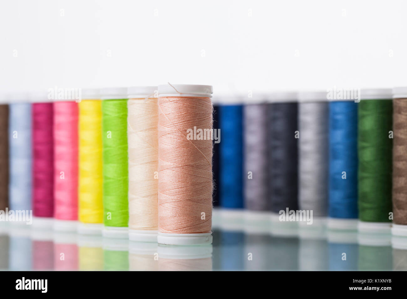 Sewing threads isolated on white background. Studio Shot Stock Photo ...
