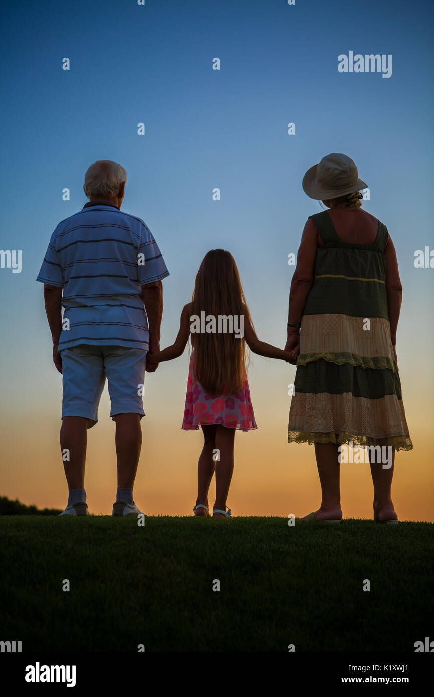Family outdoors sunset grandparents hi-res stock photography and images ...