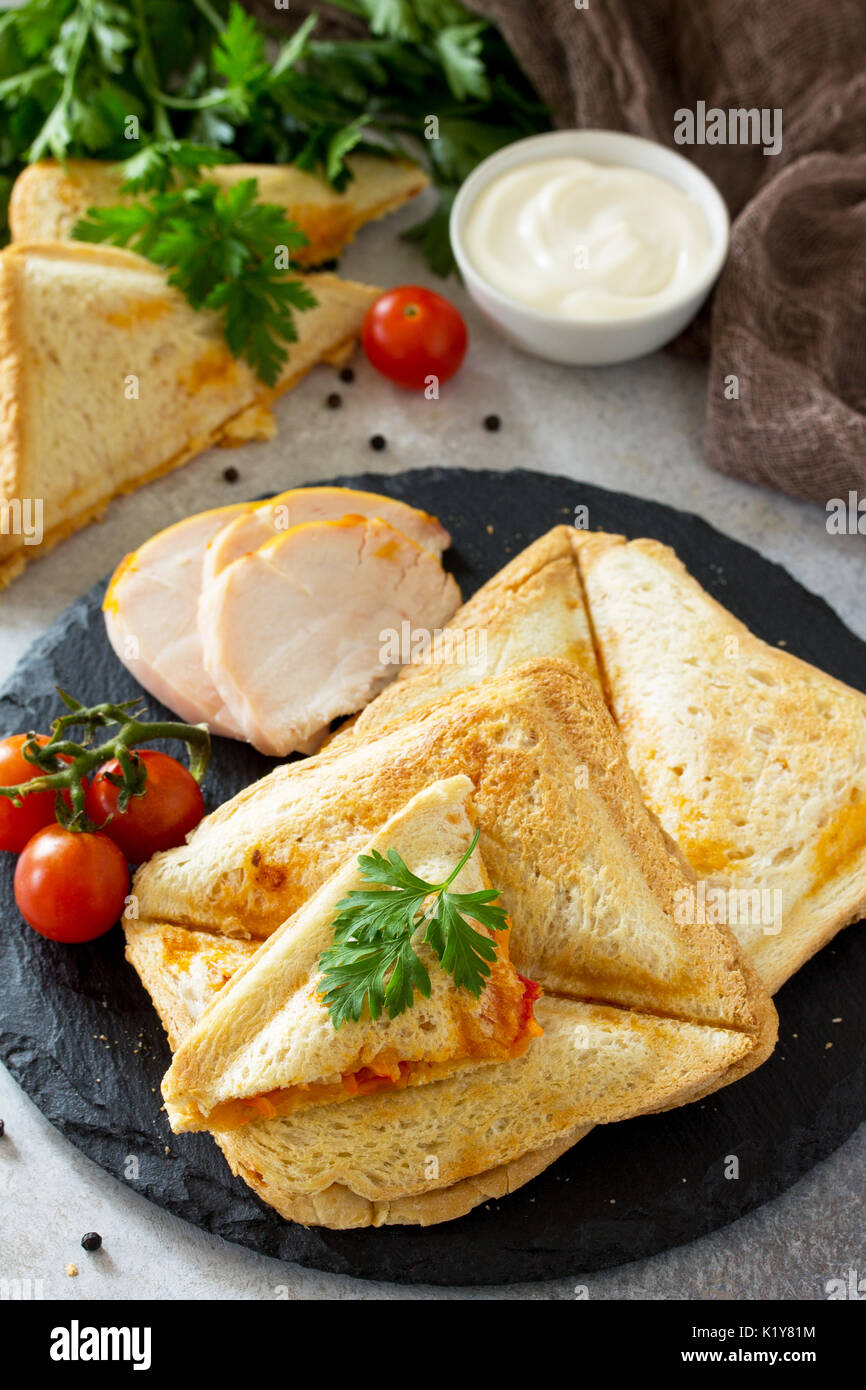 Pressed and toasted double sandwich with chicken, Korean carrots ...