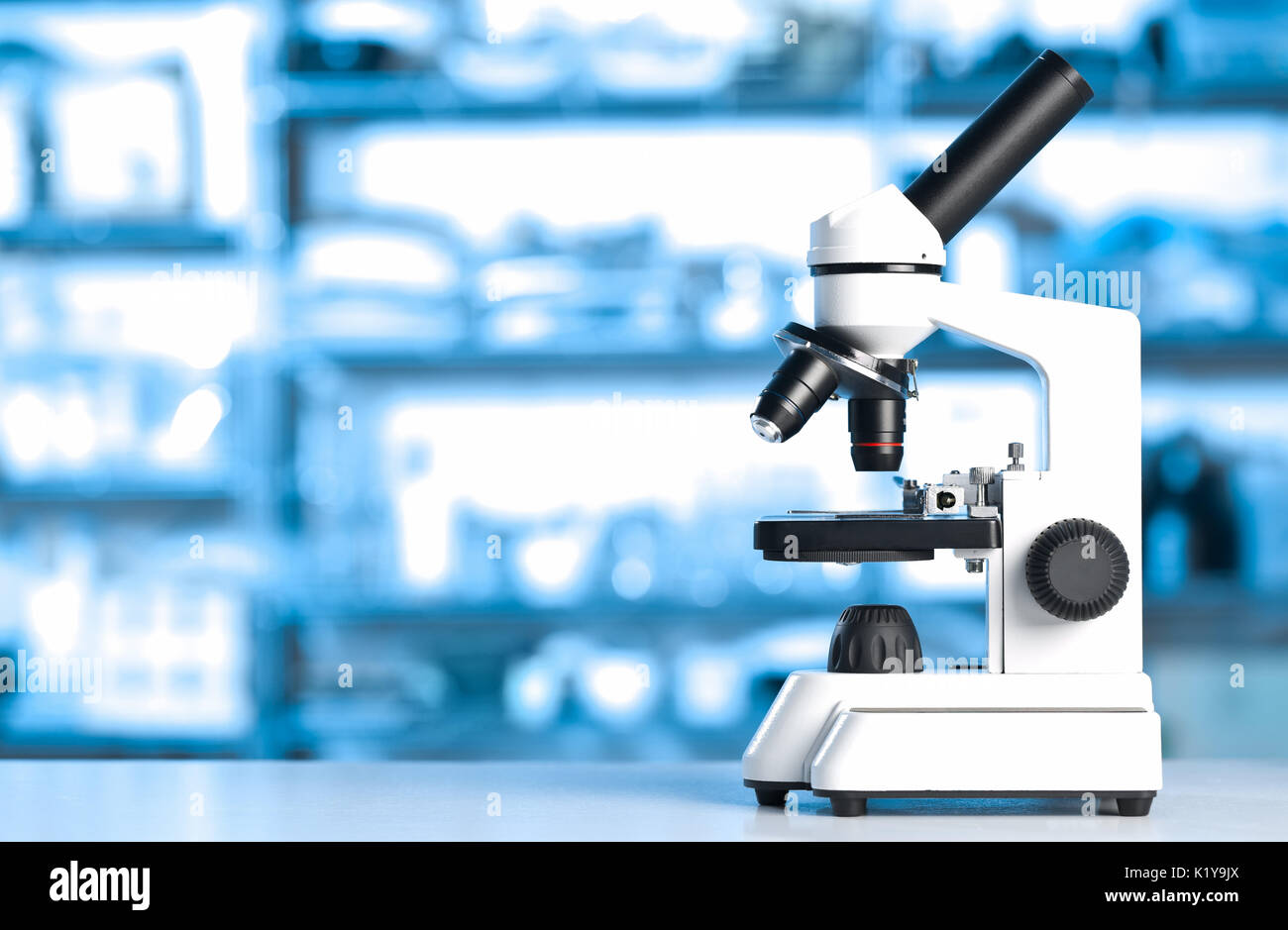 Microscope with sample with out of focus blue lab background Stock ...