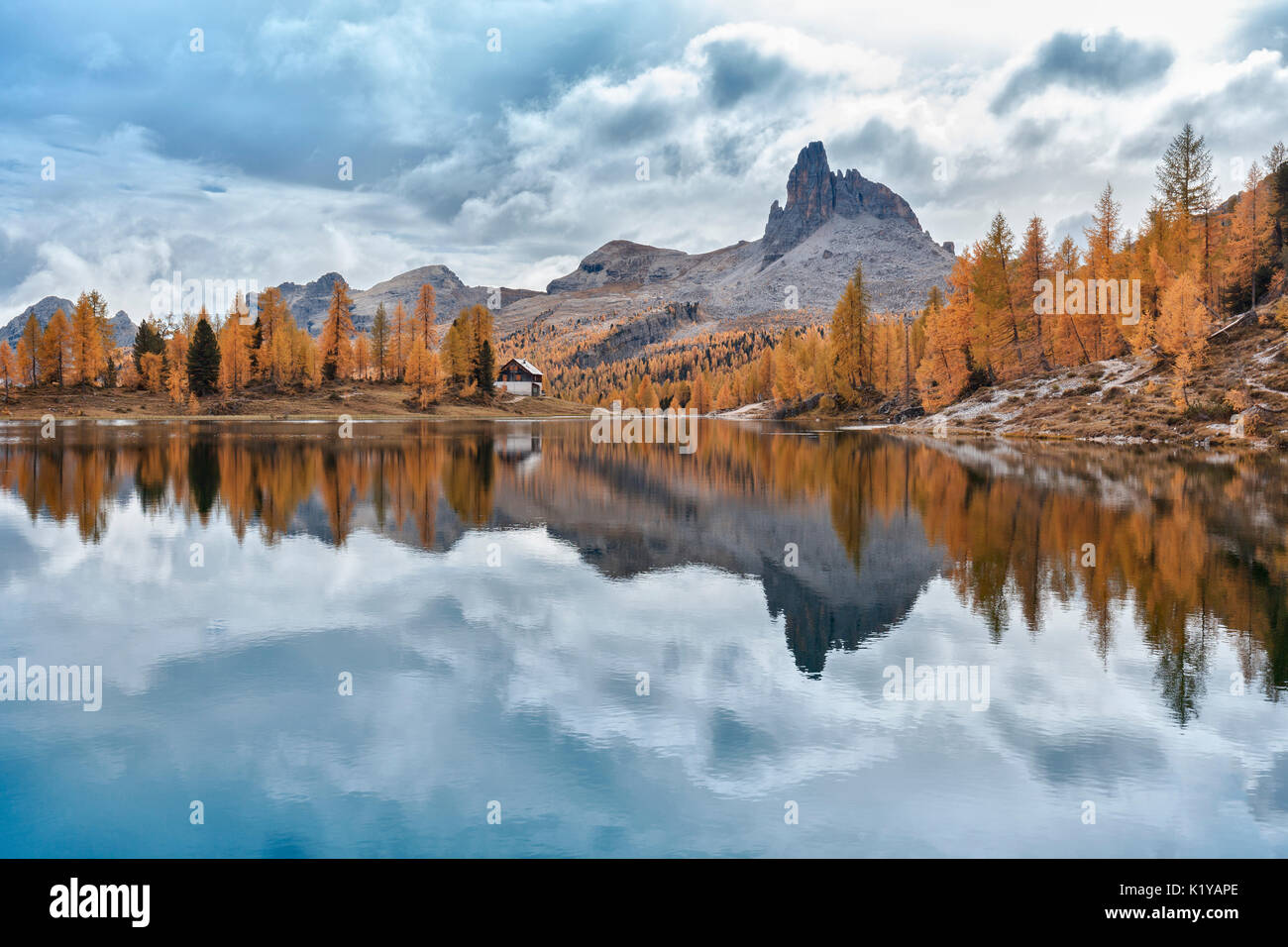 Alpine lake croda da lago hut with becco di mezzodi hi-res stock ...