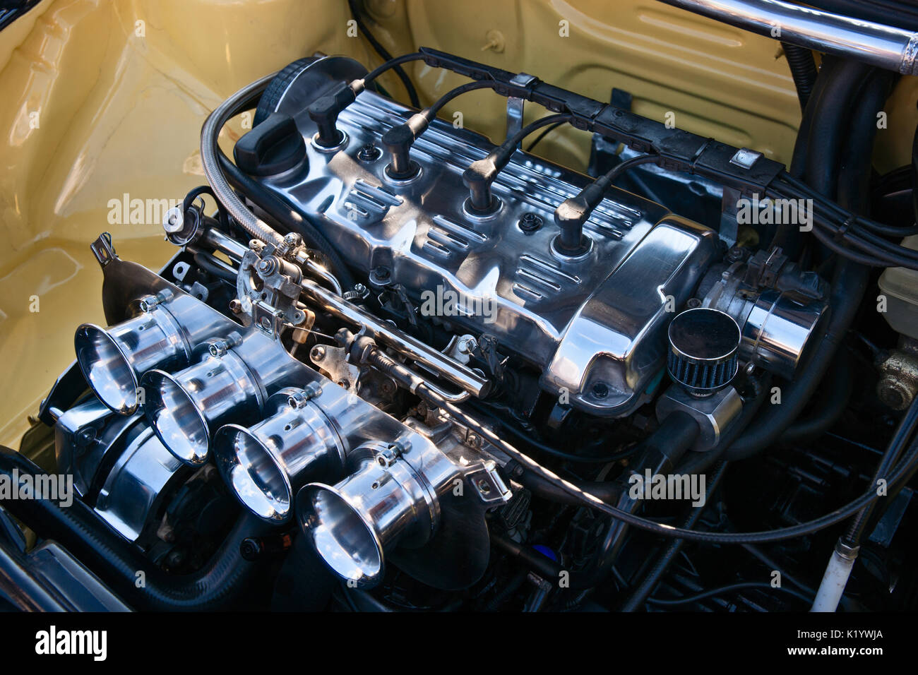 Modern automobile internal-combustion engine. White polished metal and ...