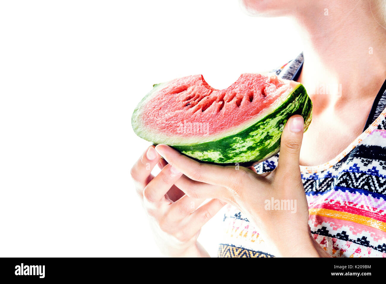 Slice of bite watermelon in woman hands on white background Stock Photo ...
