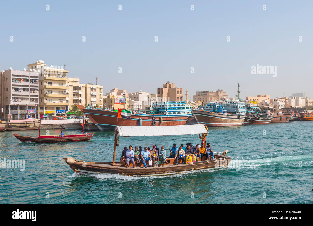 Small traditional ships and old dhow on the creek, Old Dubai, United ...