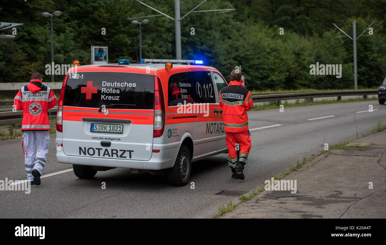 Emergency doctor in his emergency vehicle on the street, Germany Stock ...
