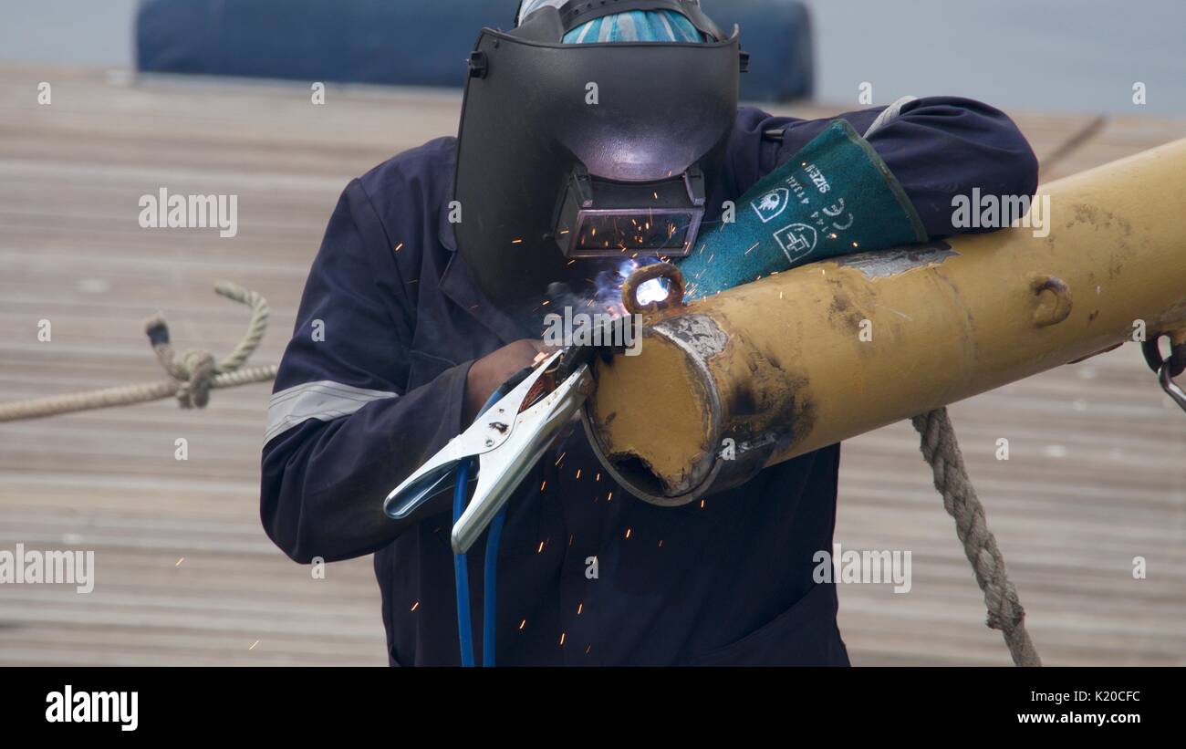 Welding on a sailboat Stock Photo - Alamy