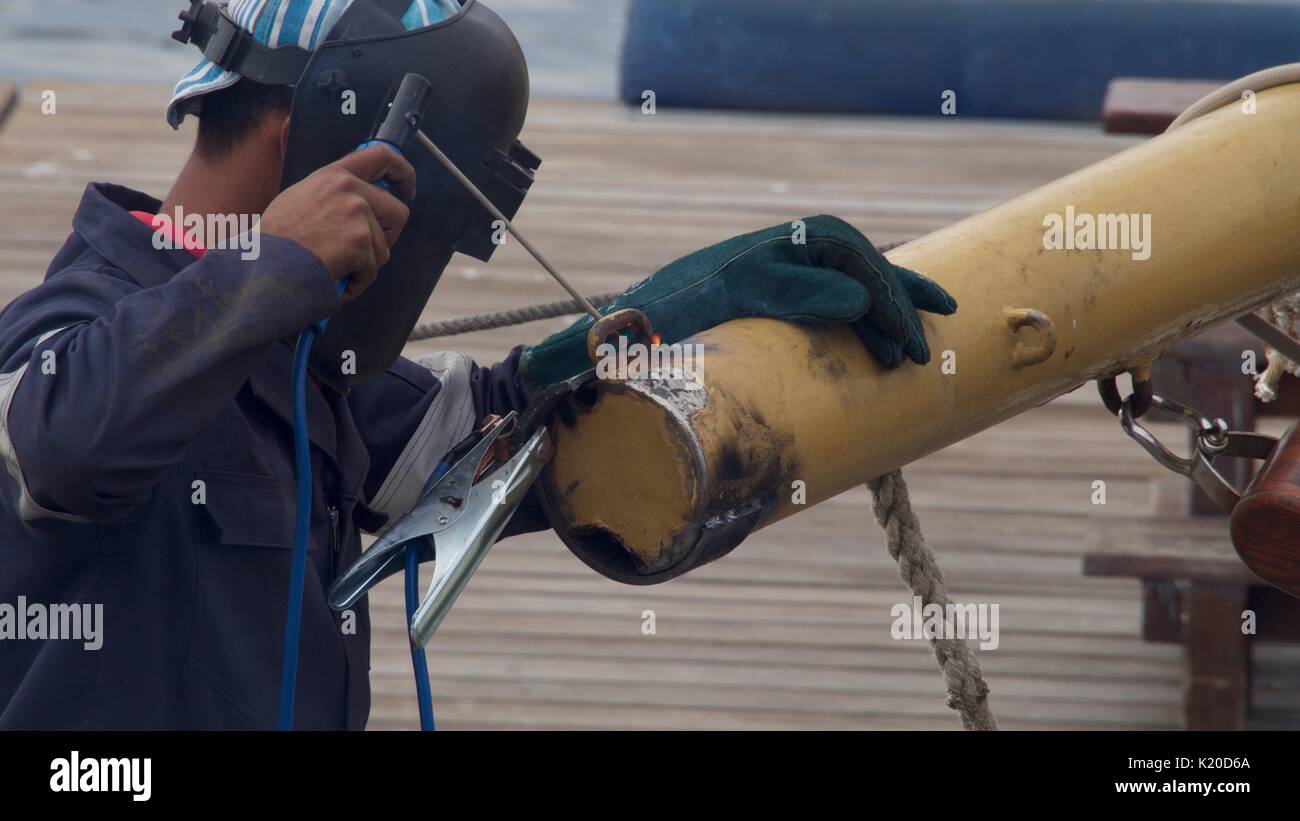 Welding on a sailboat Stock Photo - Alamy