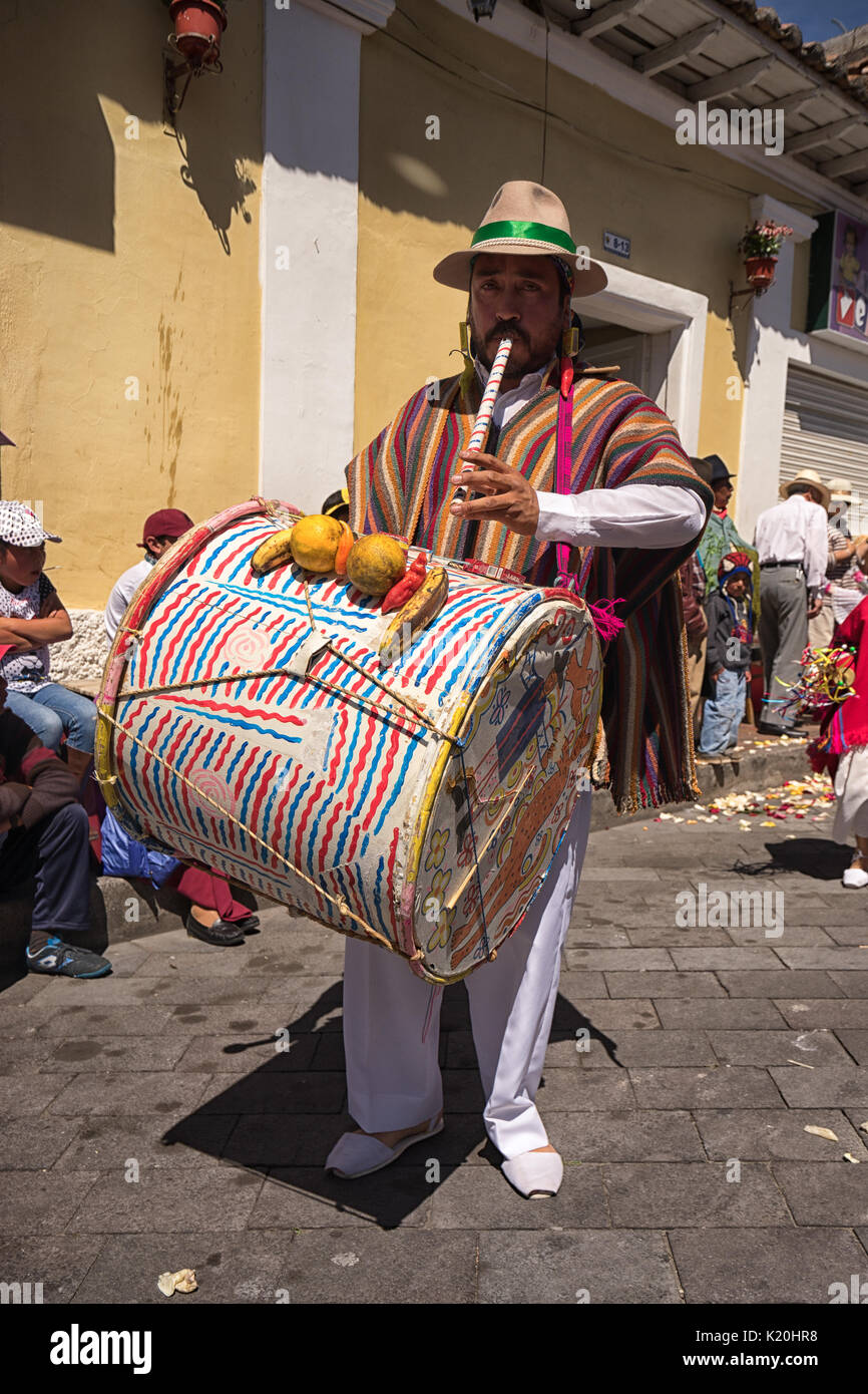 June 17, 2017 Pujili, Ecuador: indigenous quechua male drumming and ...