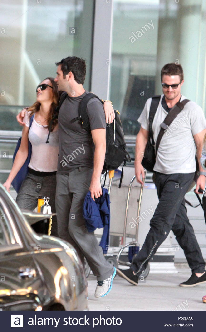 Katie Cassidy Colin Donnell And Stephen Amell Stephen Amell Hugs