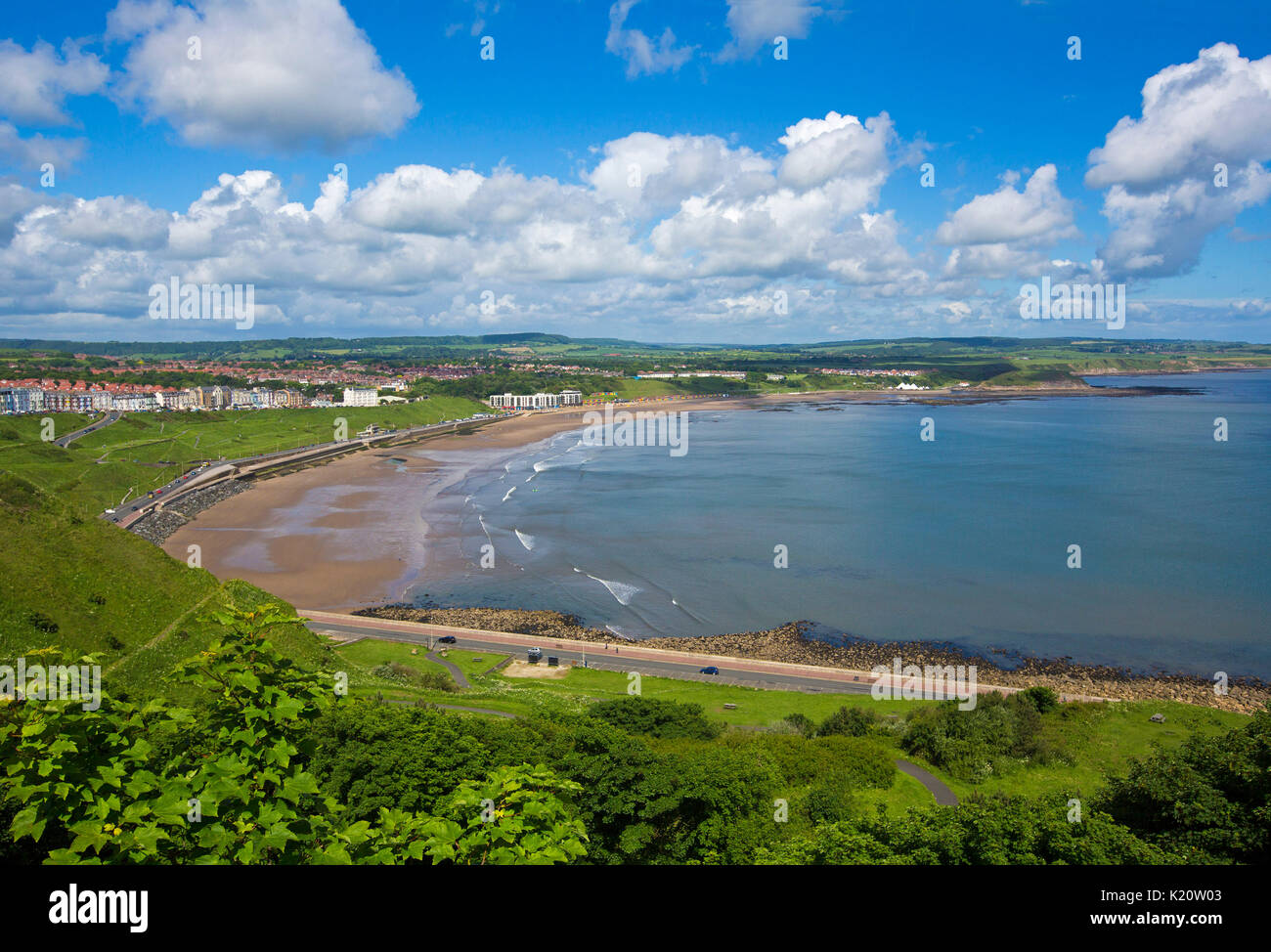 Sprawling town of Scarborough with adjacent beach, turquoise ocean, and ...
