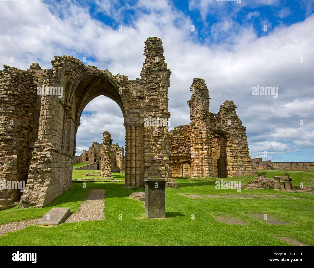 Ruins of historic Tynemouth castle and priory under blue sky, England ...