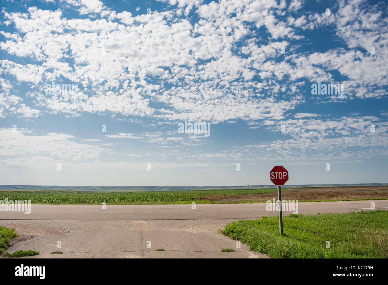 Stop Sign Under Cloudy Sky Stock Photo - Alamy
