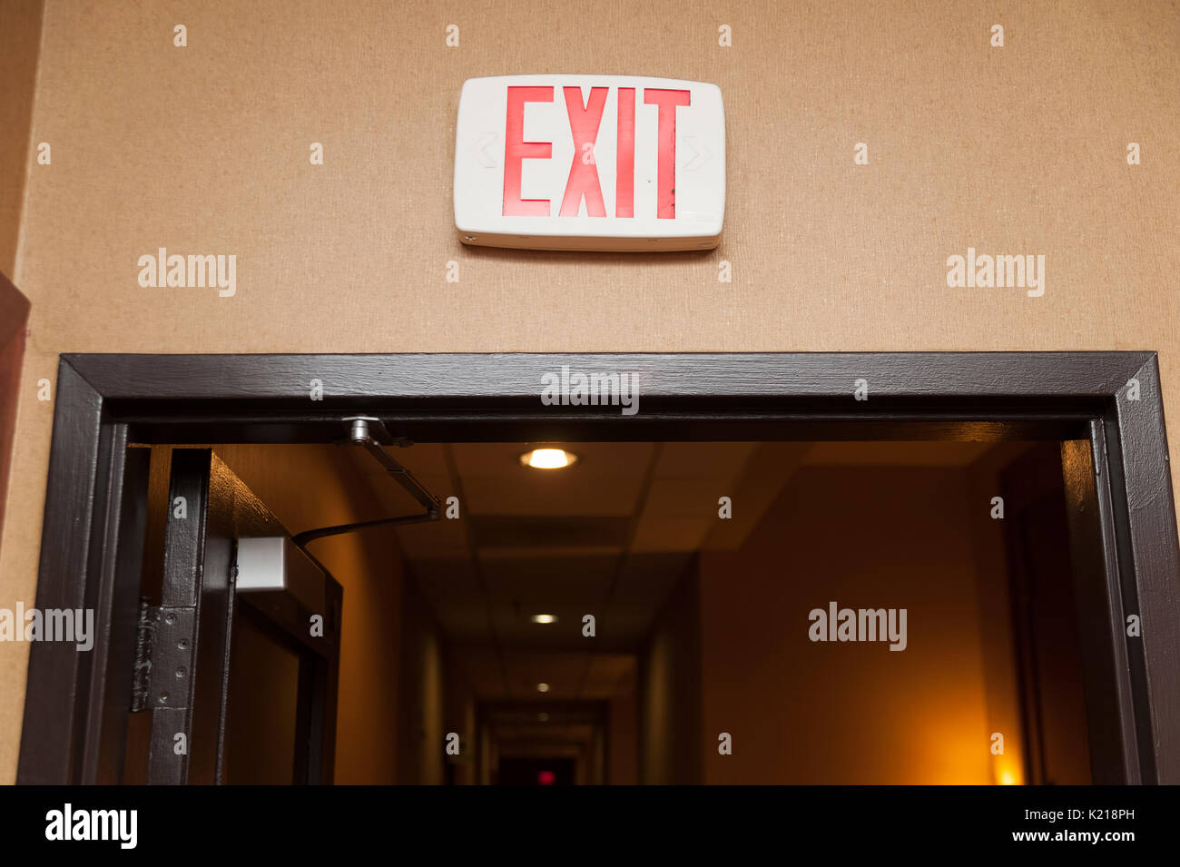 Emergency exit sign close up Stock Photo - Alamy