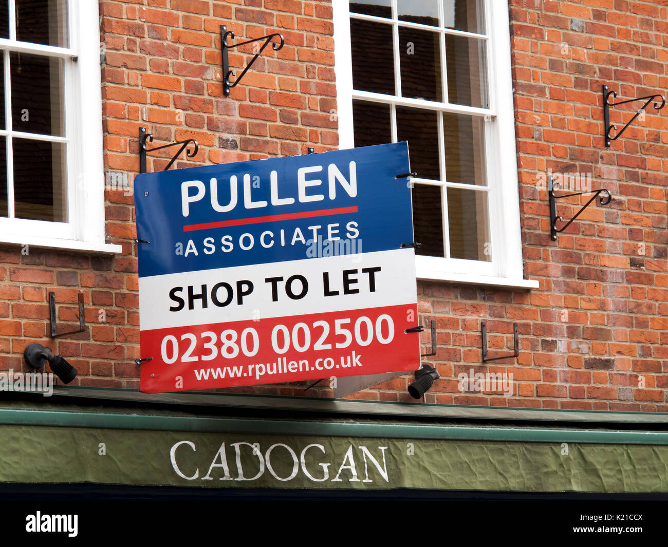 Pullen Associates shop to let advertising sign over vacant retail ...