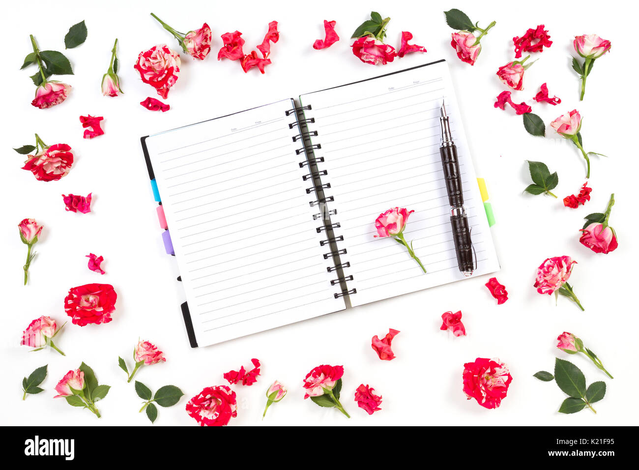 Notebook flower on desk Cut Out Stock Images & Pictures - Alamy