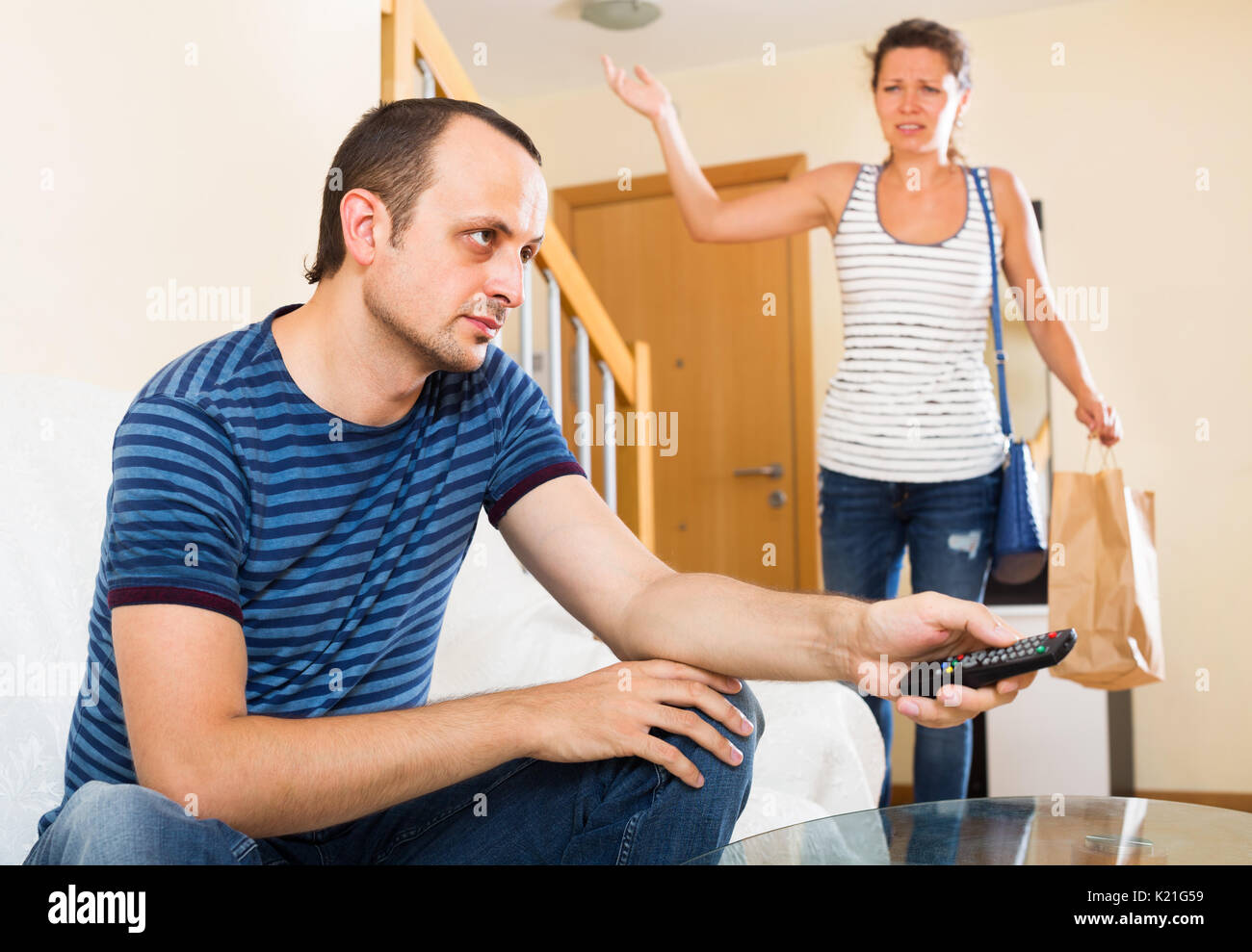 Family couple having the serious conversation at the home Stock Photo ...