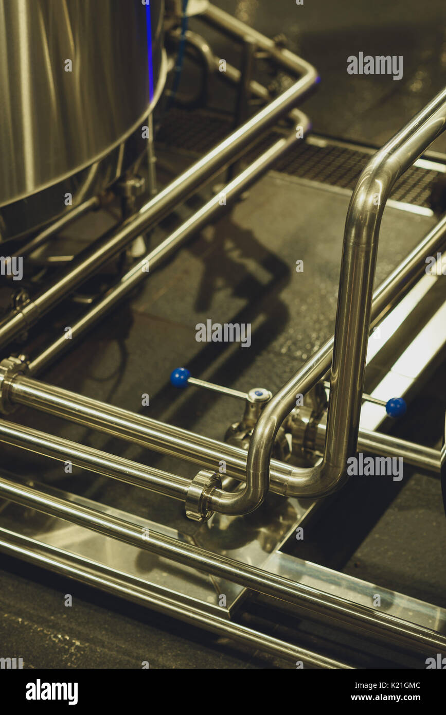 Modern brewery equipment with pipes for giving of malt and water Stock ...