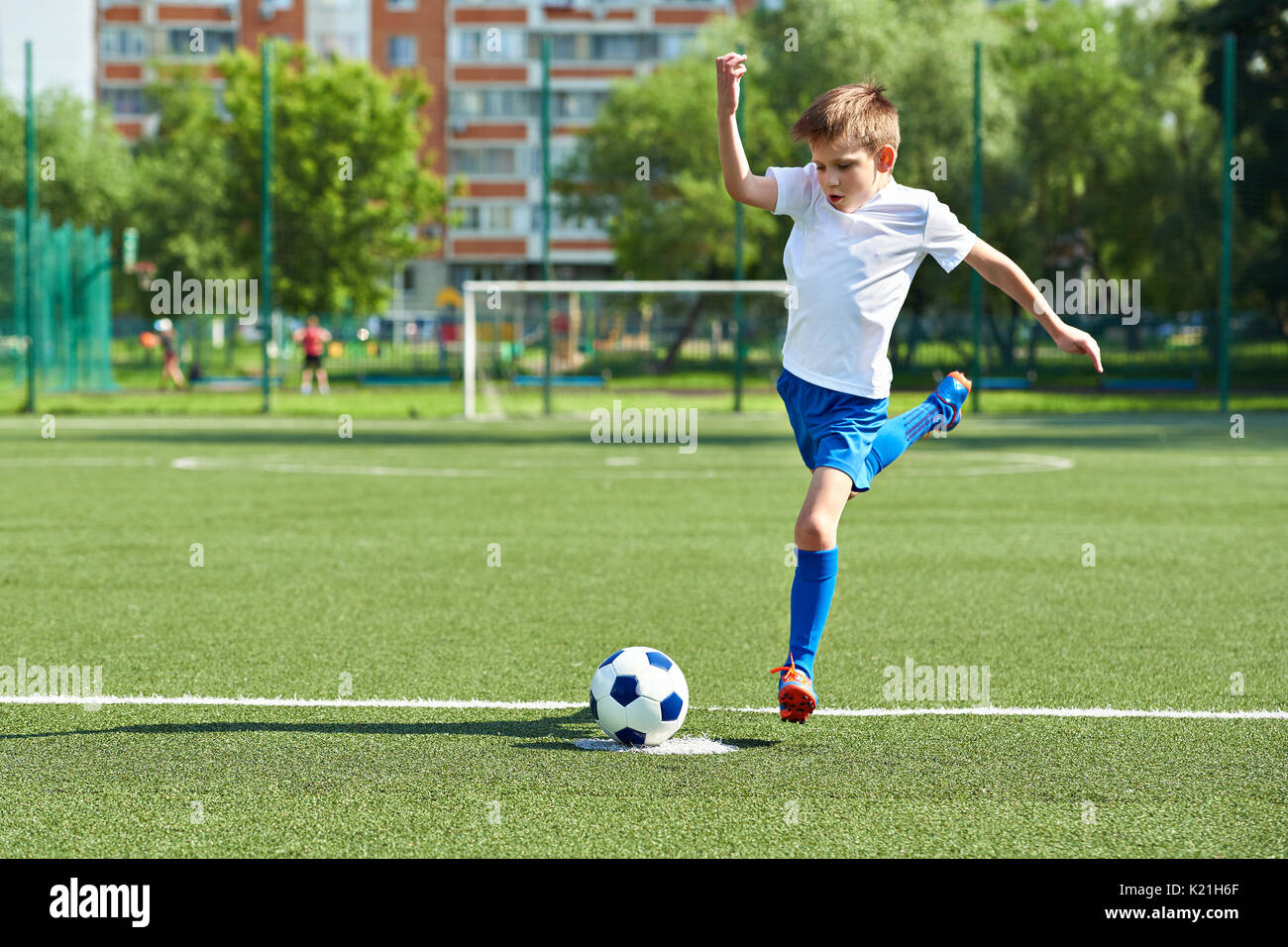 Soccer goal with soccer ball on a soccer field hi-res stock photography ...