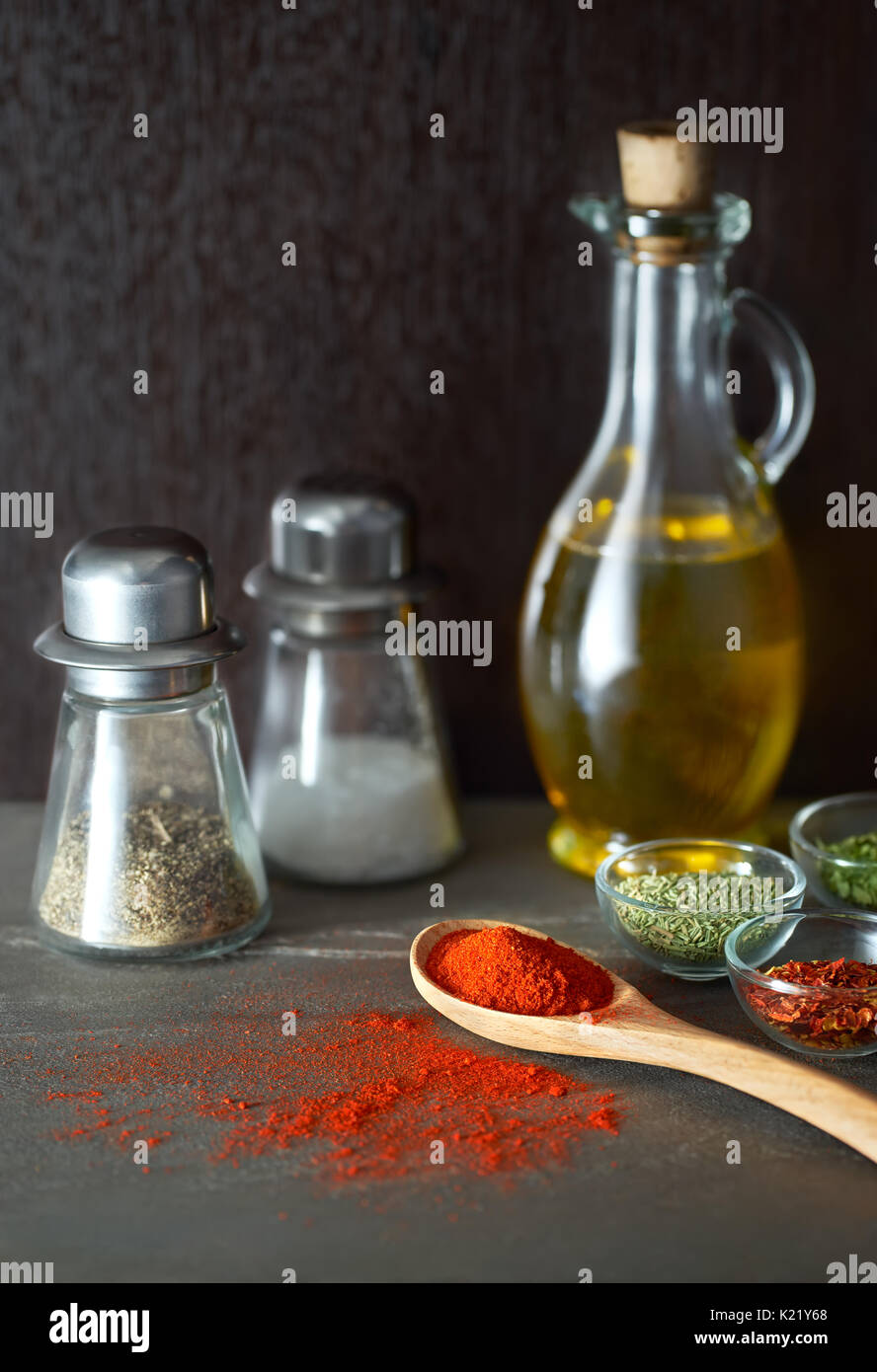 Clashing spices from spoon and other kitchen utensils Stock Photo - Alamy