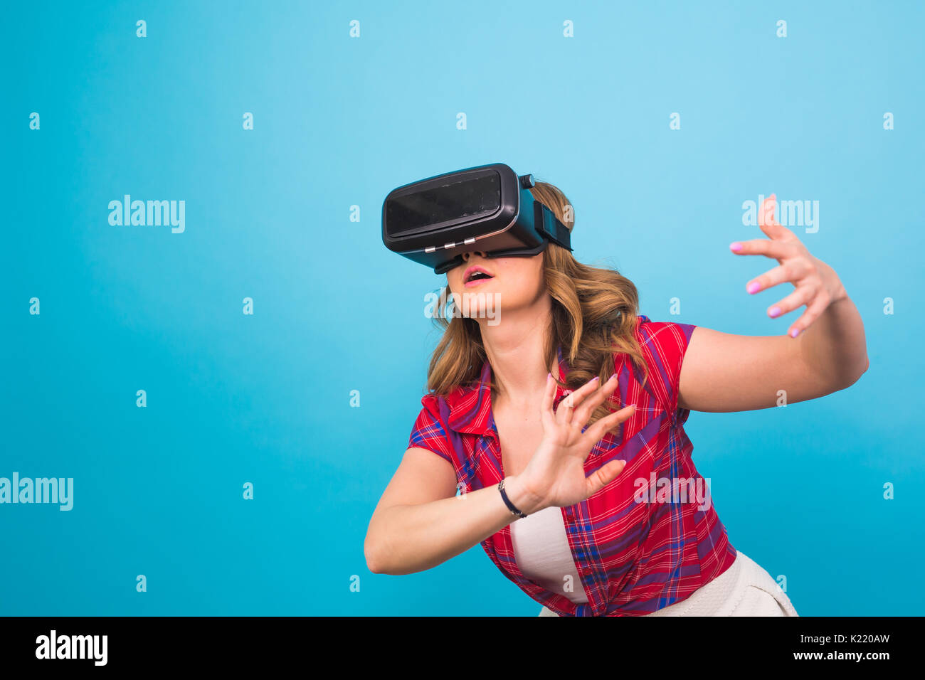 Technology, virtual reality, entertainment and people concept - happy ...