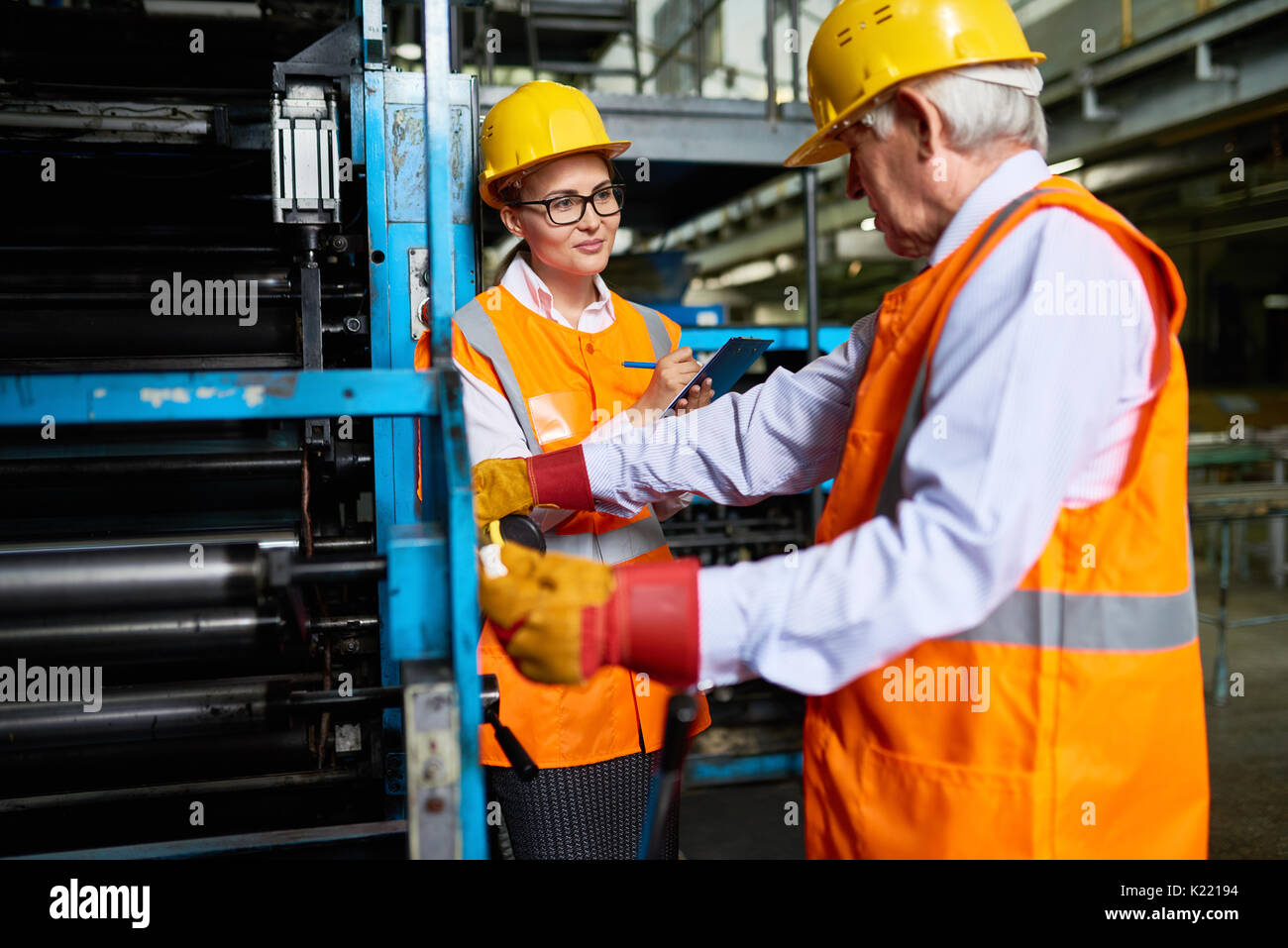 Workers in Factory Workshop Stock Photo - Alamy