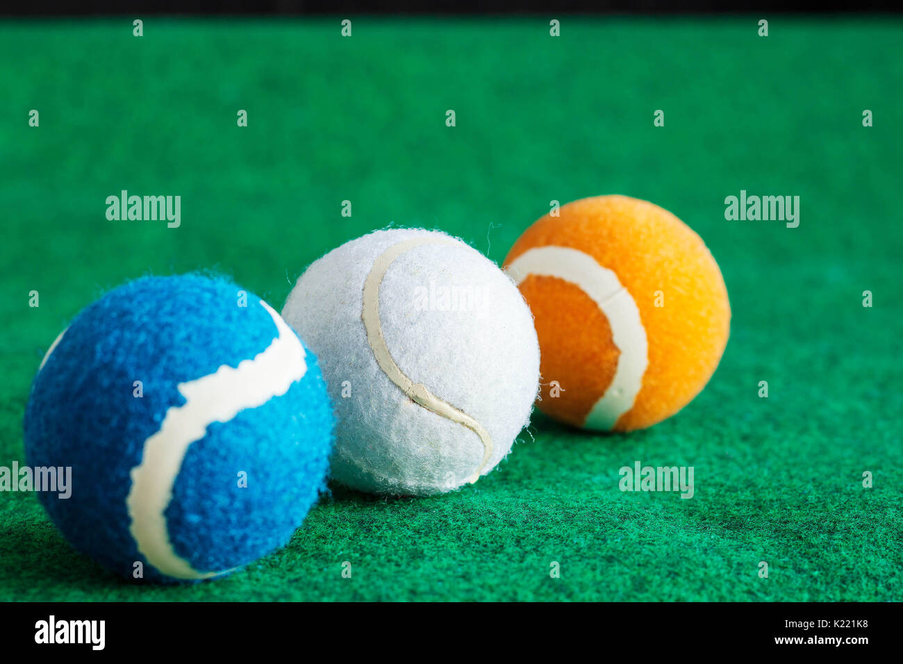 Close up of three tennis balls hi-res stock photography and images - Alamy