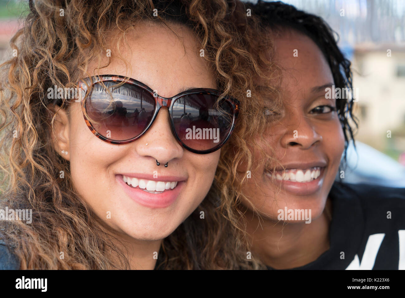 Portraits of two young women Stock Photo - Alamy
