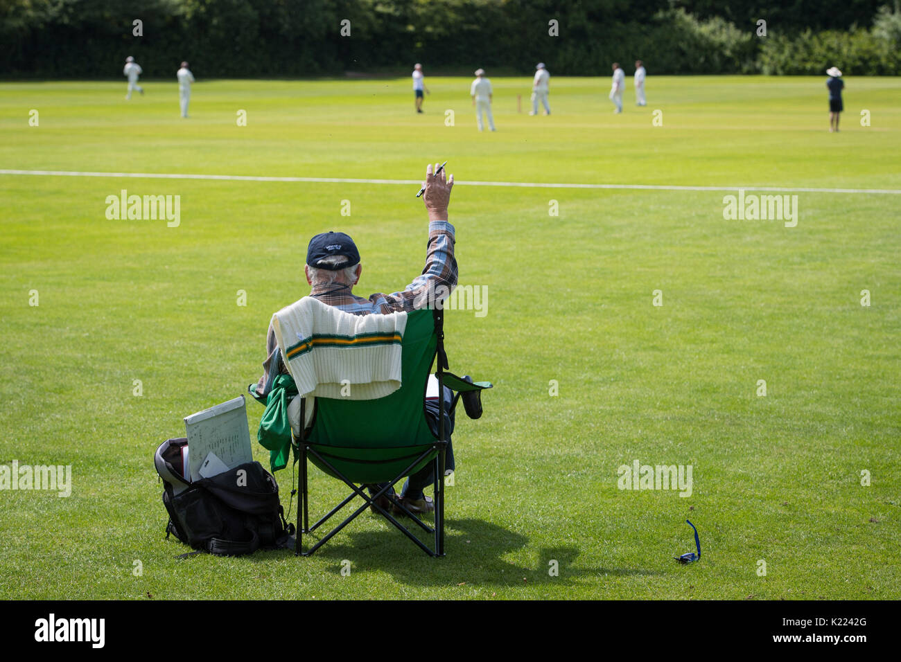 A spectator watches a match between Tonbridge Exiles Cricket Club and ...