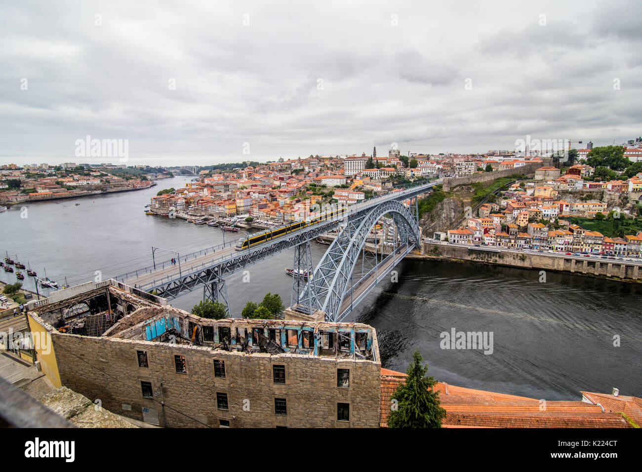 View of the iconic Dom Luis I bridge crossing the Douro River, and the ...