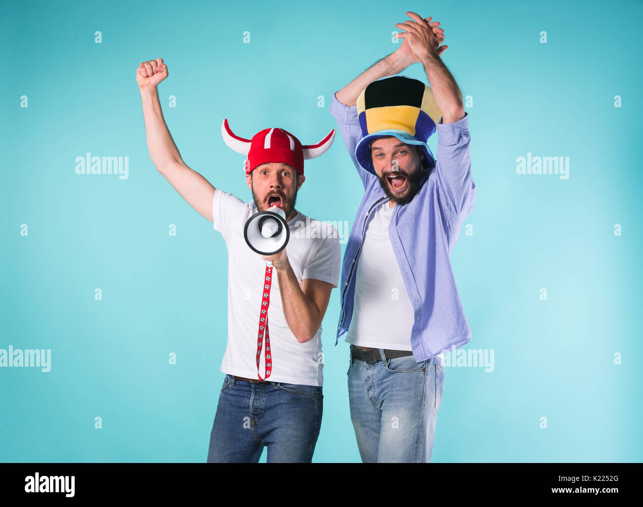Two Excited Male Friends Celebrate Watching Sports Stock Photo - Alamy