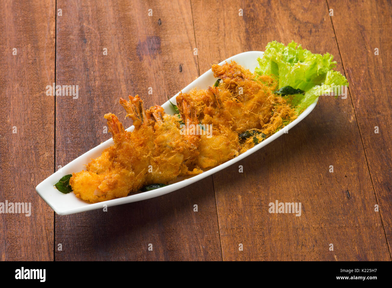 fried asian style butter prawn Stock Photo - Alamy