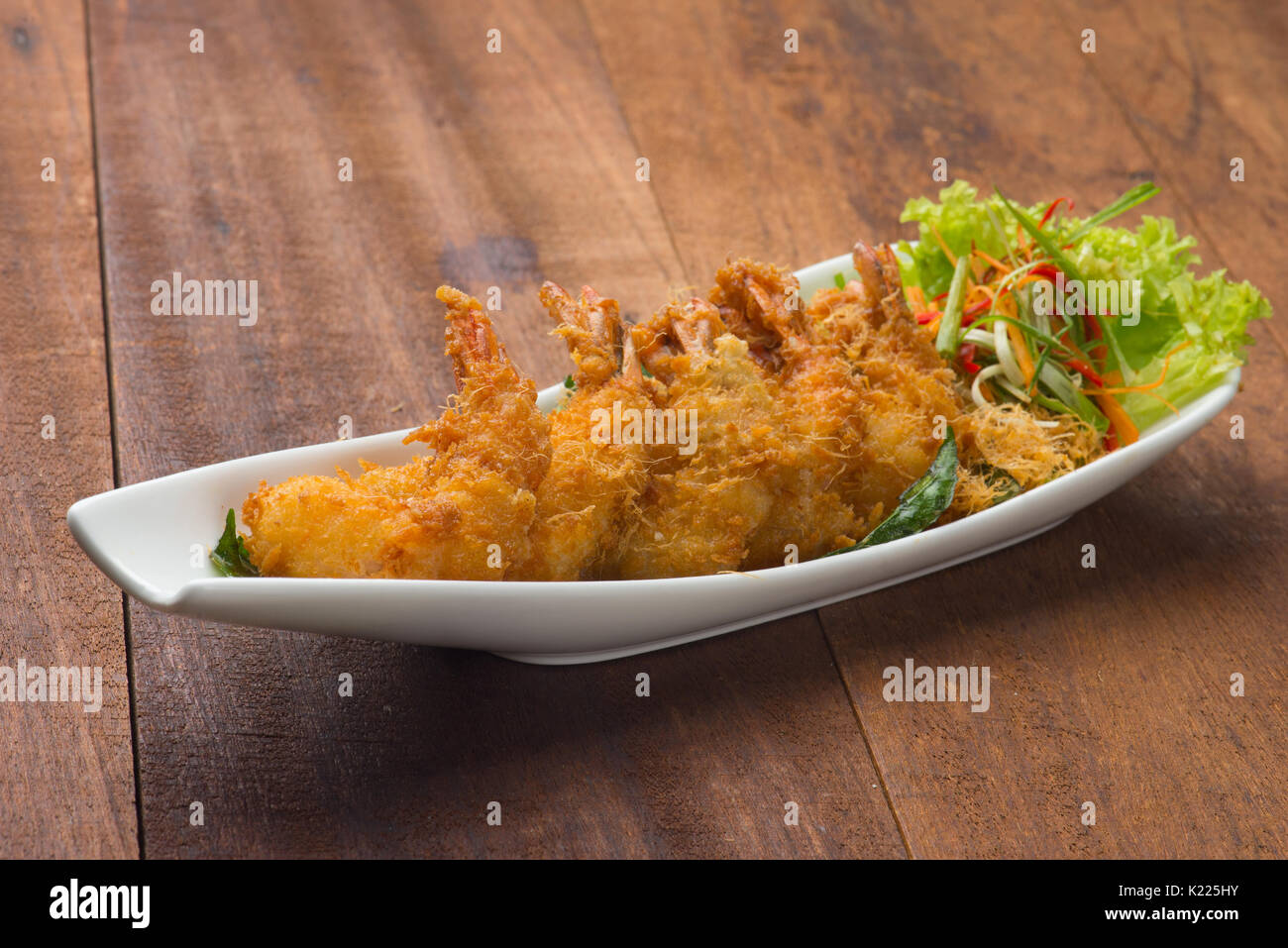 fried asian style butter prawn Stock Photo - Alamy