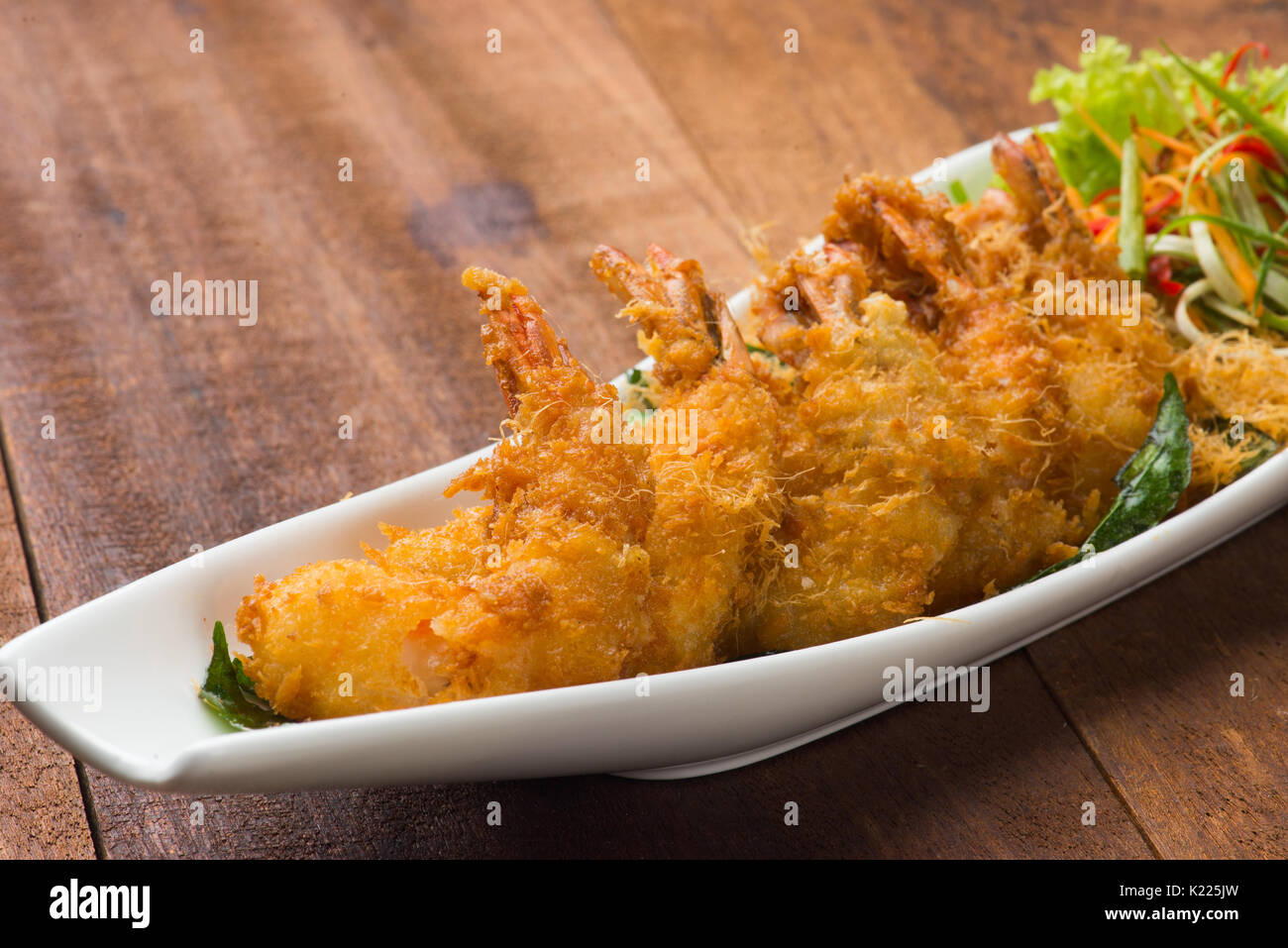 fried asian style butter prawn Stock Photo - Alamy