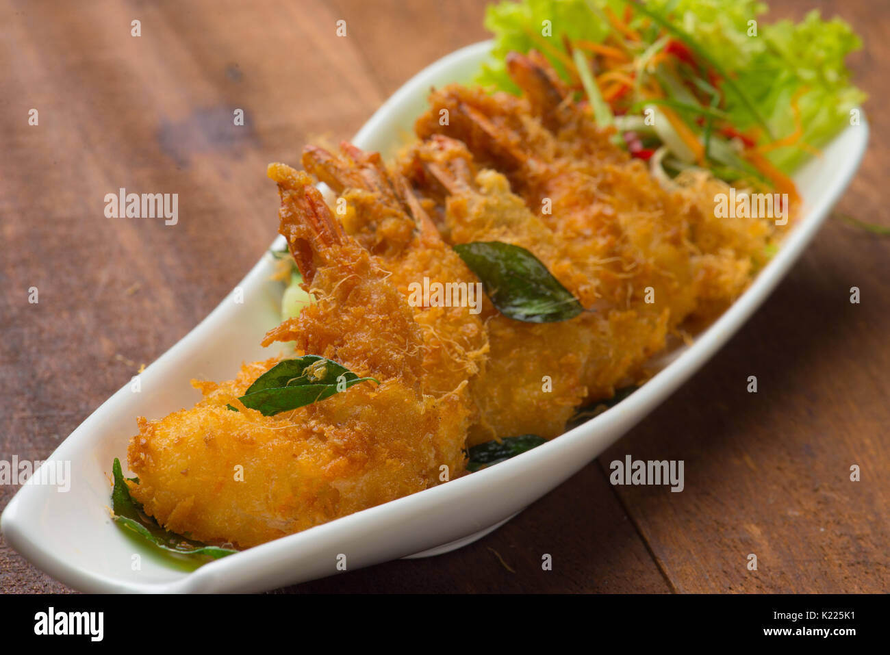 fried asian style butter prawn Stock Photo - Alamy