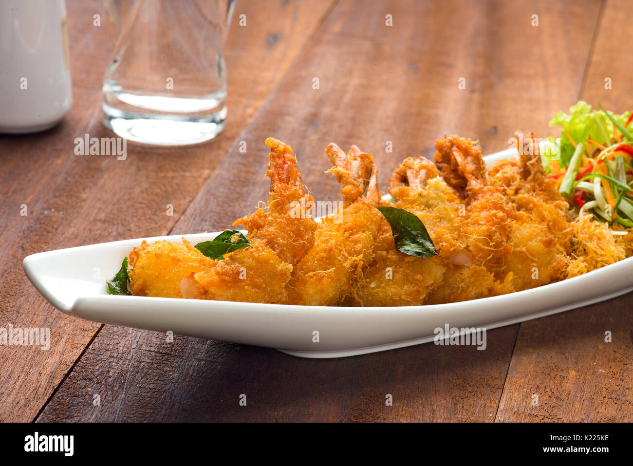fried asian style butter prawn Stock Photo - Alamy