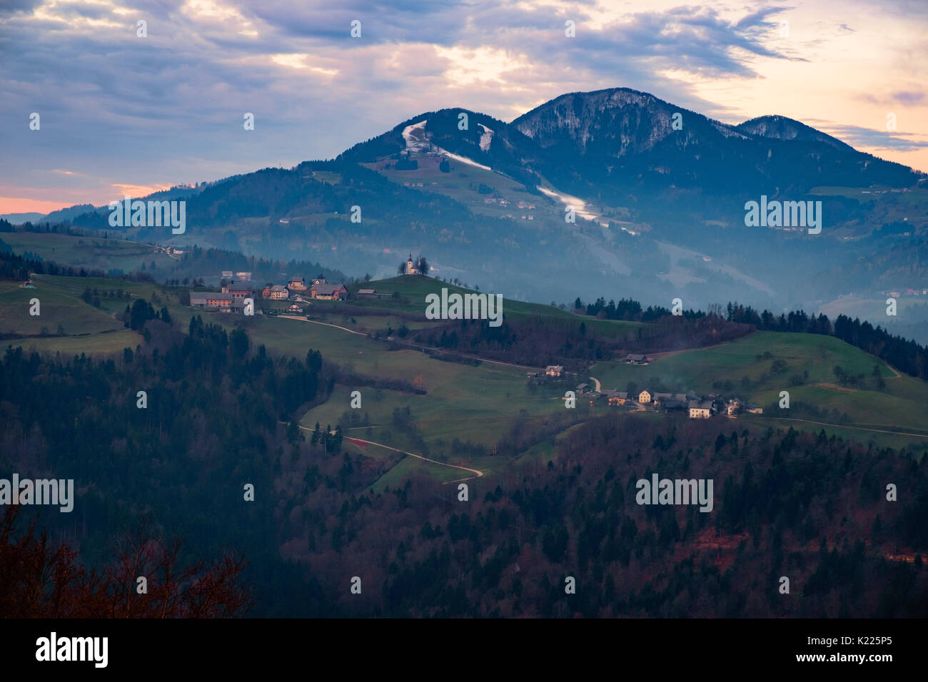 Spring panorama of St Thomas with ski slopes at Stari vrh and Blegos ...