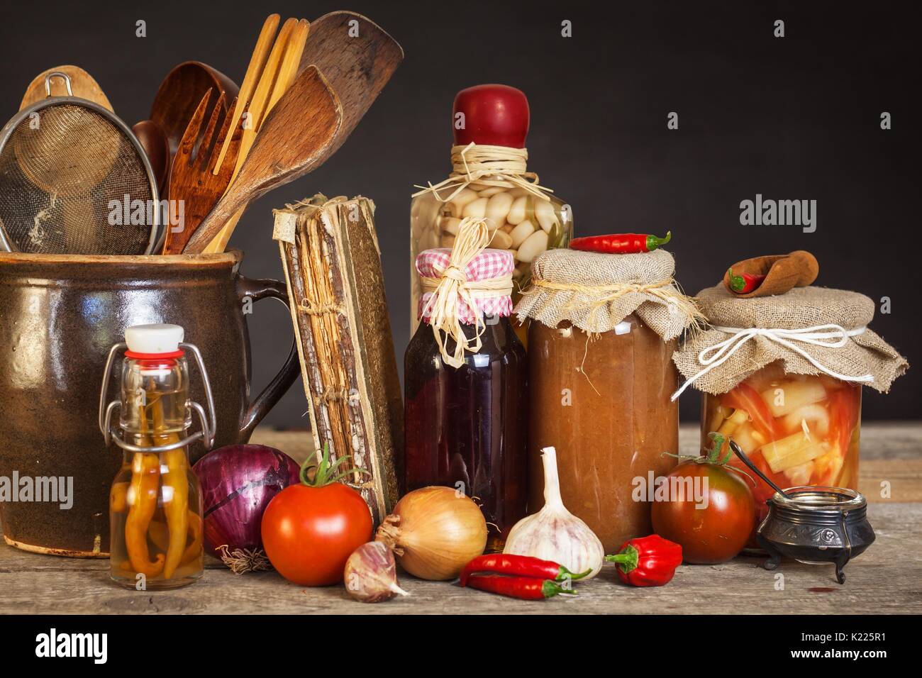Kitchen table and cooking ingredients. Vegetables and kitchen tools ...