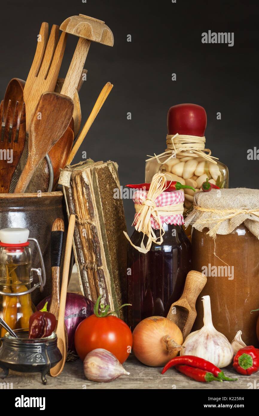 Kitchen table and cooking ingredients. Vegetables and kitchen tools ...