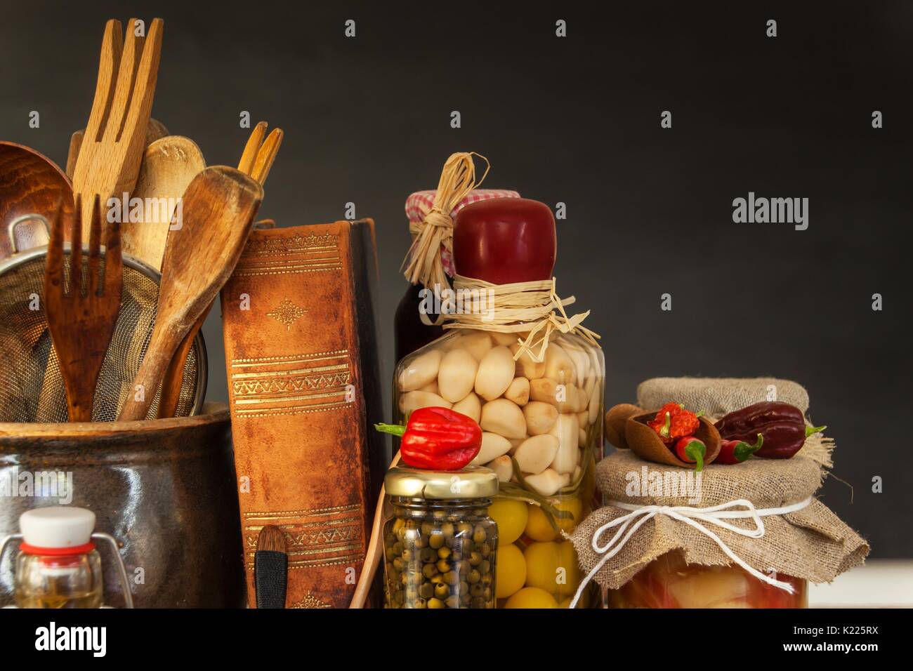 Kitchen table and cooking ingredients. Vegetables and kitchen tools ...