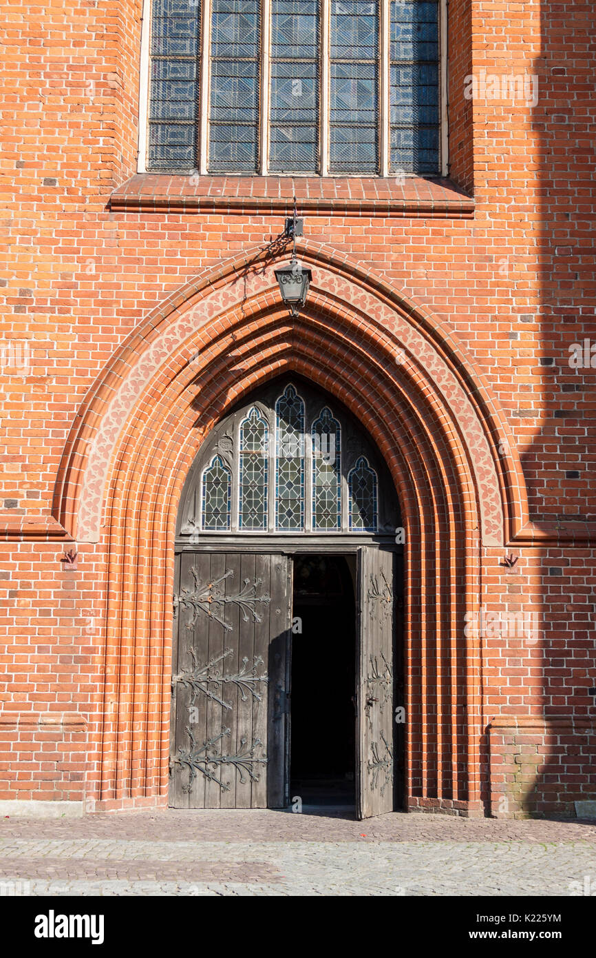 Fragment of the wall and the entrance to Cathedral in Pelplin - Poland ...