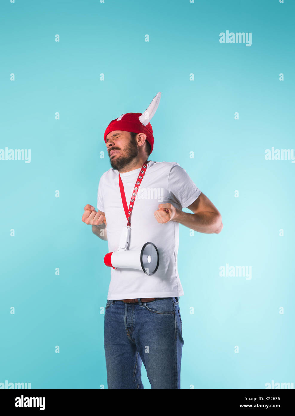 The football fan over blue Stock Photo - Alamy