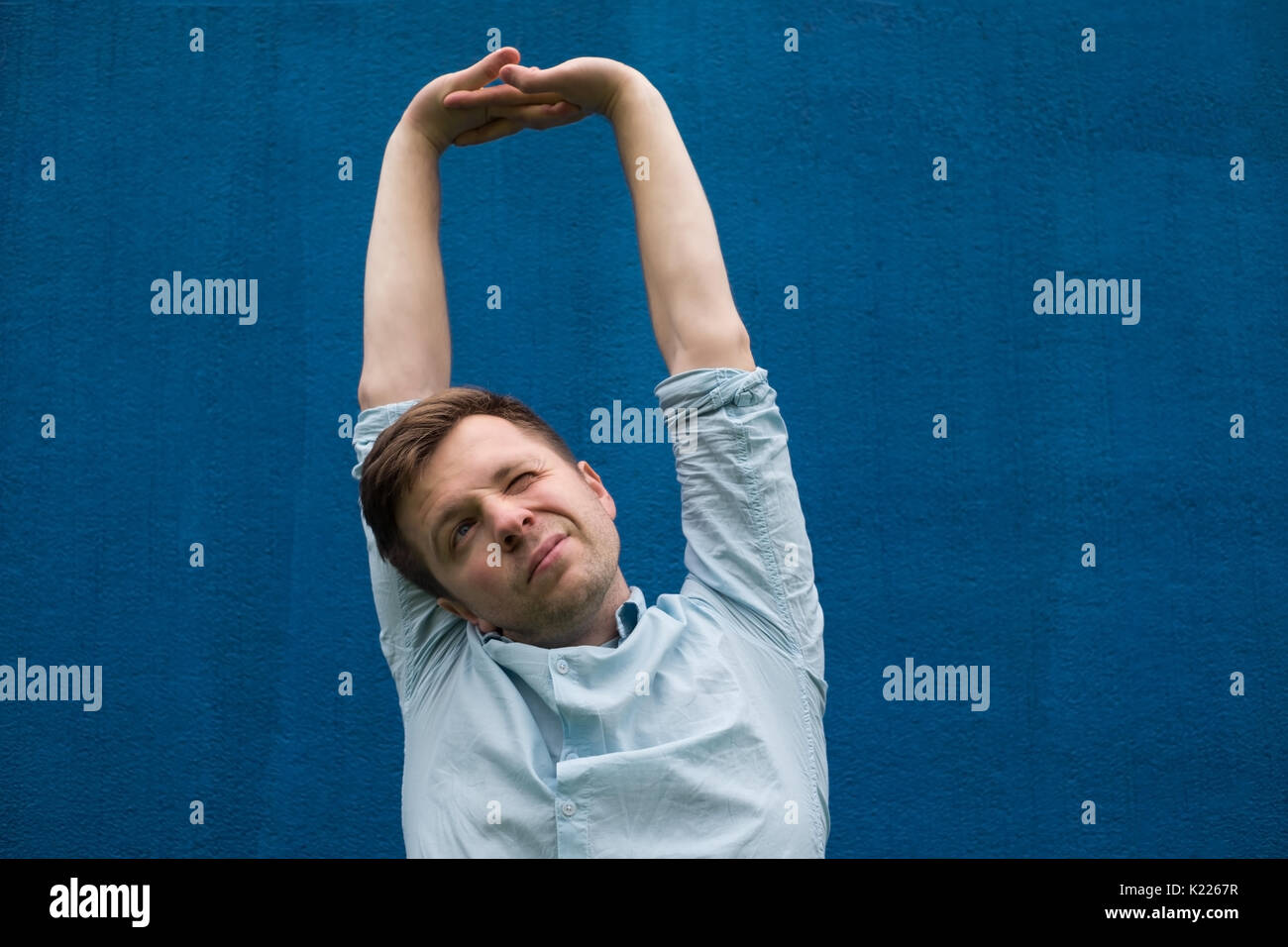 Man stretching office hi-res stock photography and images - Alamy