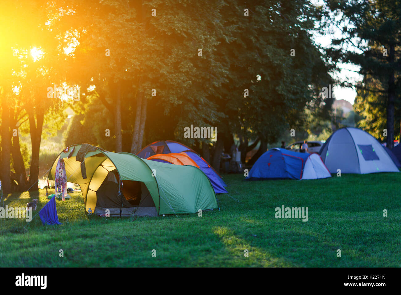 Tent camp in summer park Stock Photo - Alamy