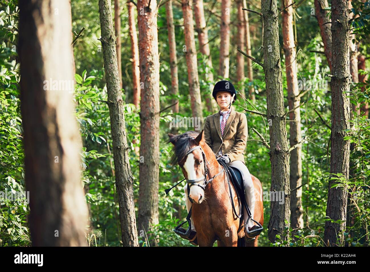 Girl horseback riding forest hi-res stock photography and images - Alamy