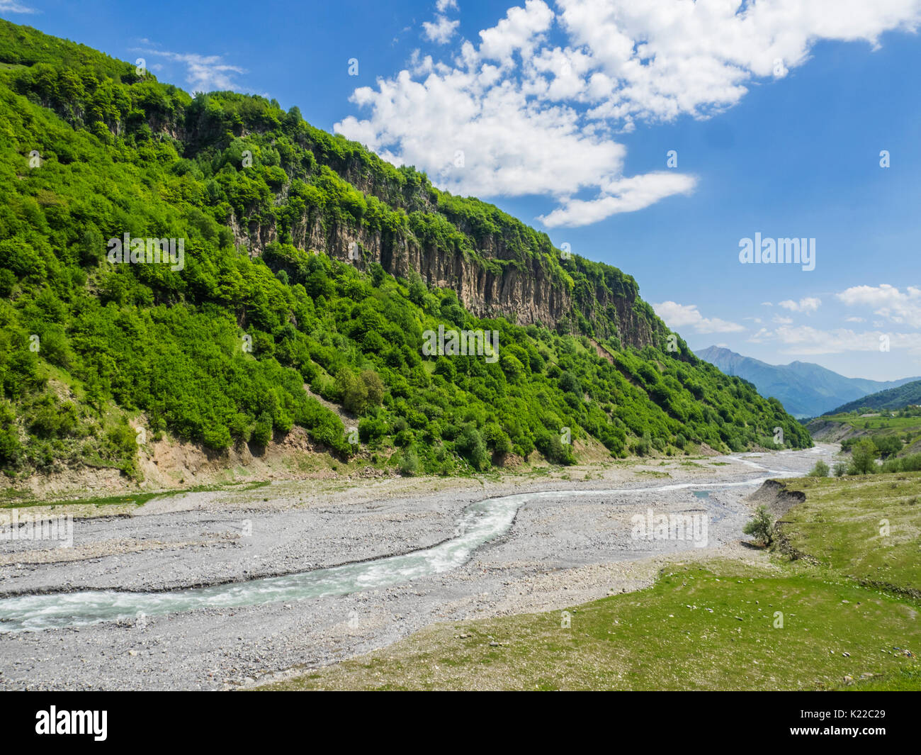 Valley of the Aragvi River. The slopes of the valley overgrown with ...