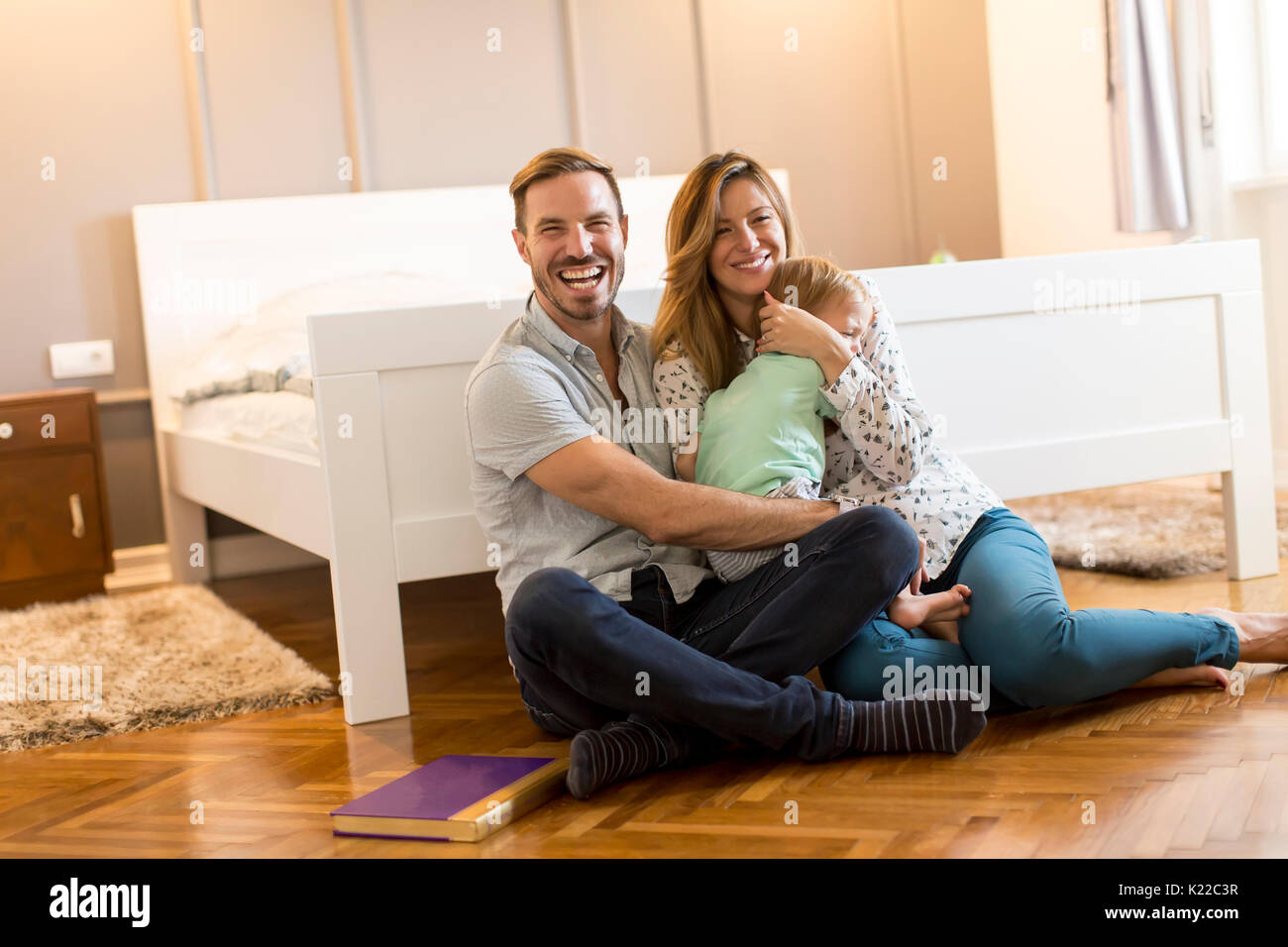 Happy family hugging hi-res stock photography and images - Alamy