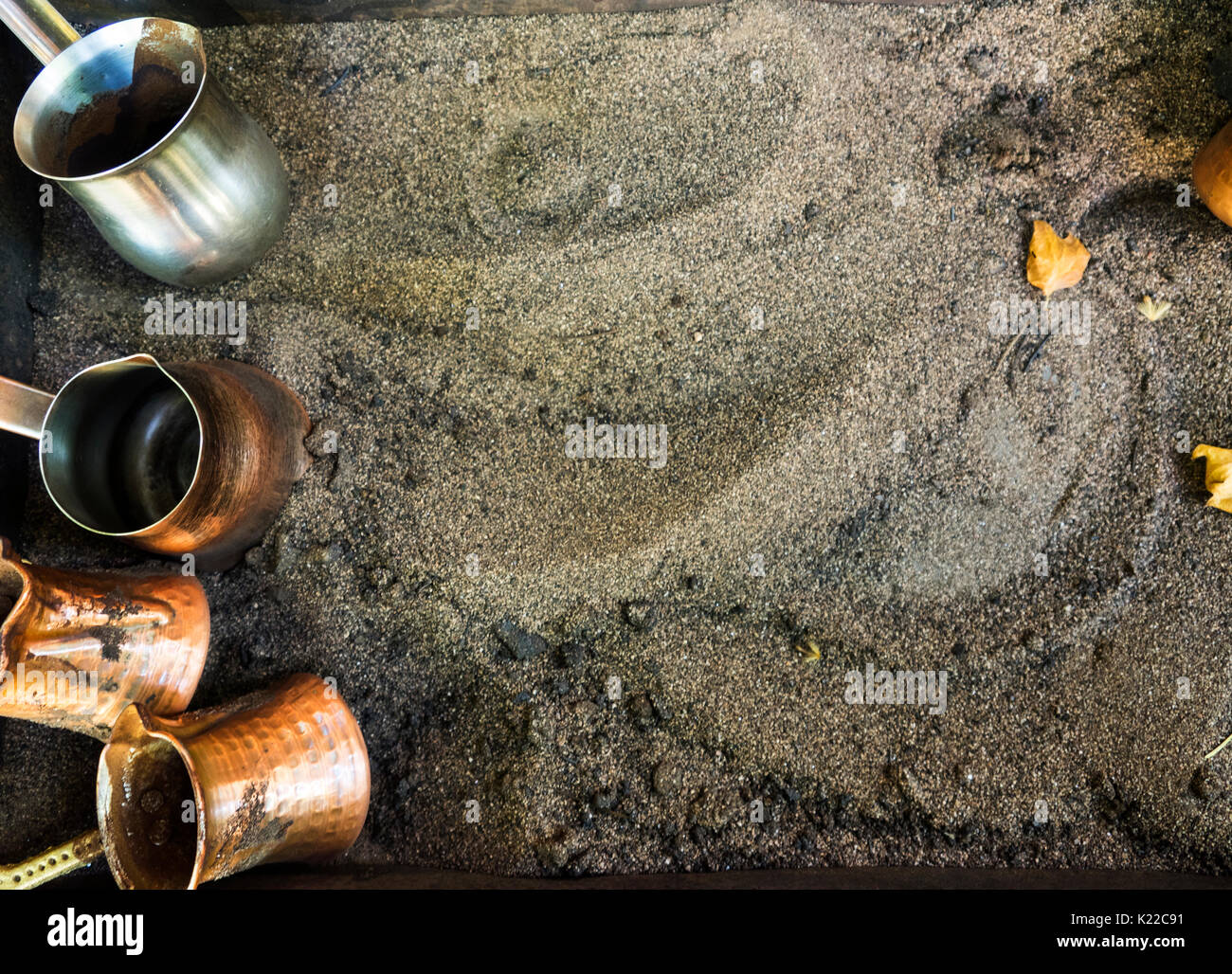 Copper gazves on the sand Stock Photo - Alamy