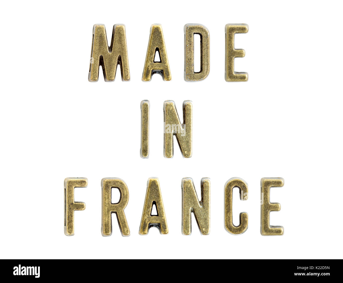Vintage copper letters forming text made in France isolated on the ...
